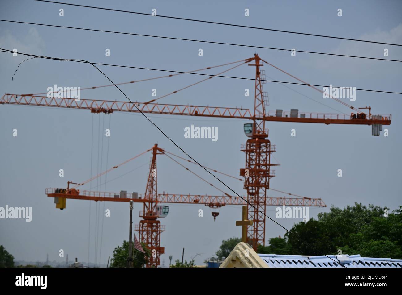 construction side making building by heavy chains Stock Photo - Alamy