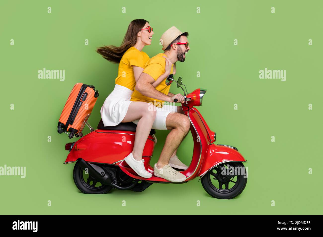 Full size profile photo of two cheerful excited partners drive bike ...