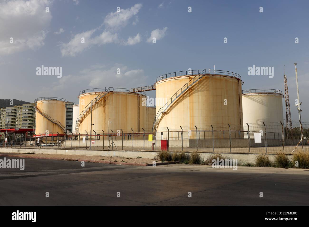 Tank farm, large white industrial tanks for petrol and oil Stock Photo ...