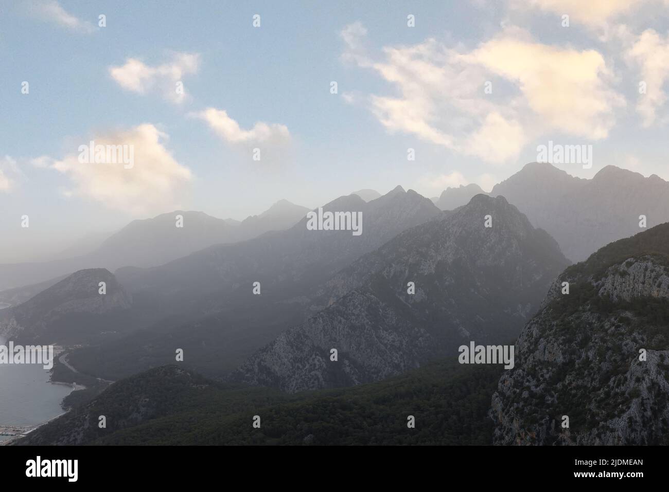 Breathtaking view of canyon hills and mountains in morning fog Stock ...