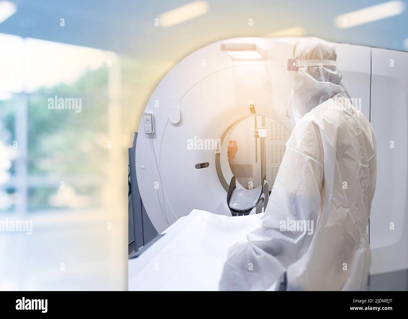 Medical staff wearing PPE suit with face shield, medical mask and ...