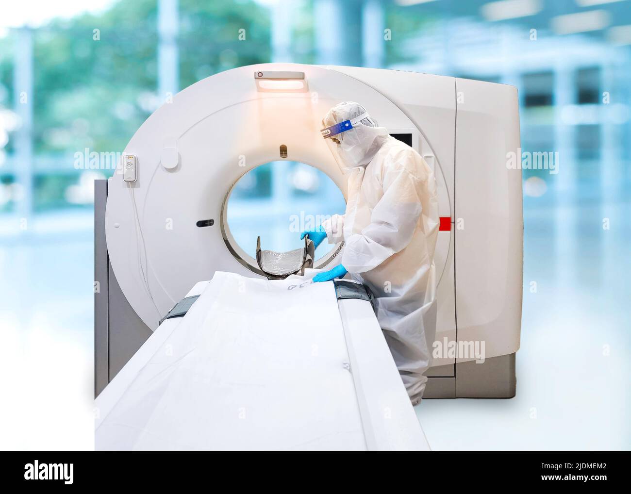 Medical staff wearing PPE suit with face shield, medical mask and ...