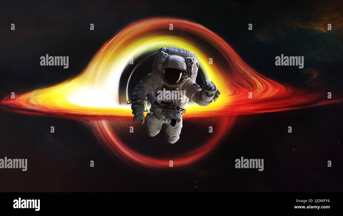 Astronaut in deep space close to the black hole and event horizon ...