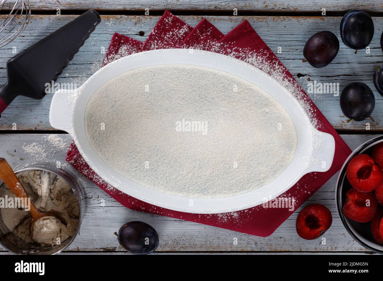 Recipe for grated pie with plum filling, top view, rustic style Stock ...