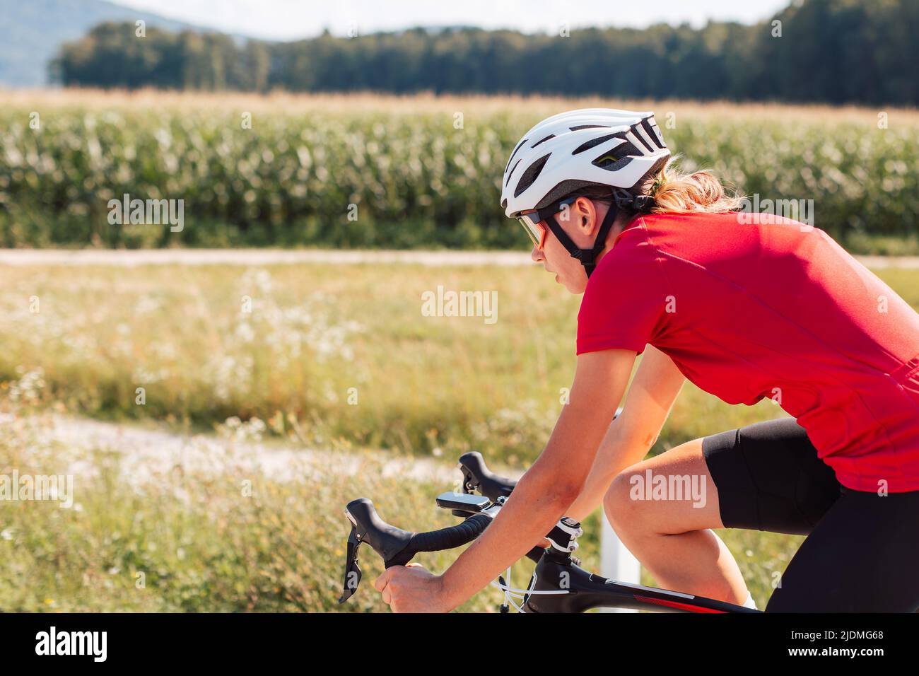 Professional woman cyclist cycling on hi-res stock photography and ...