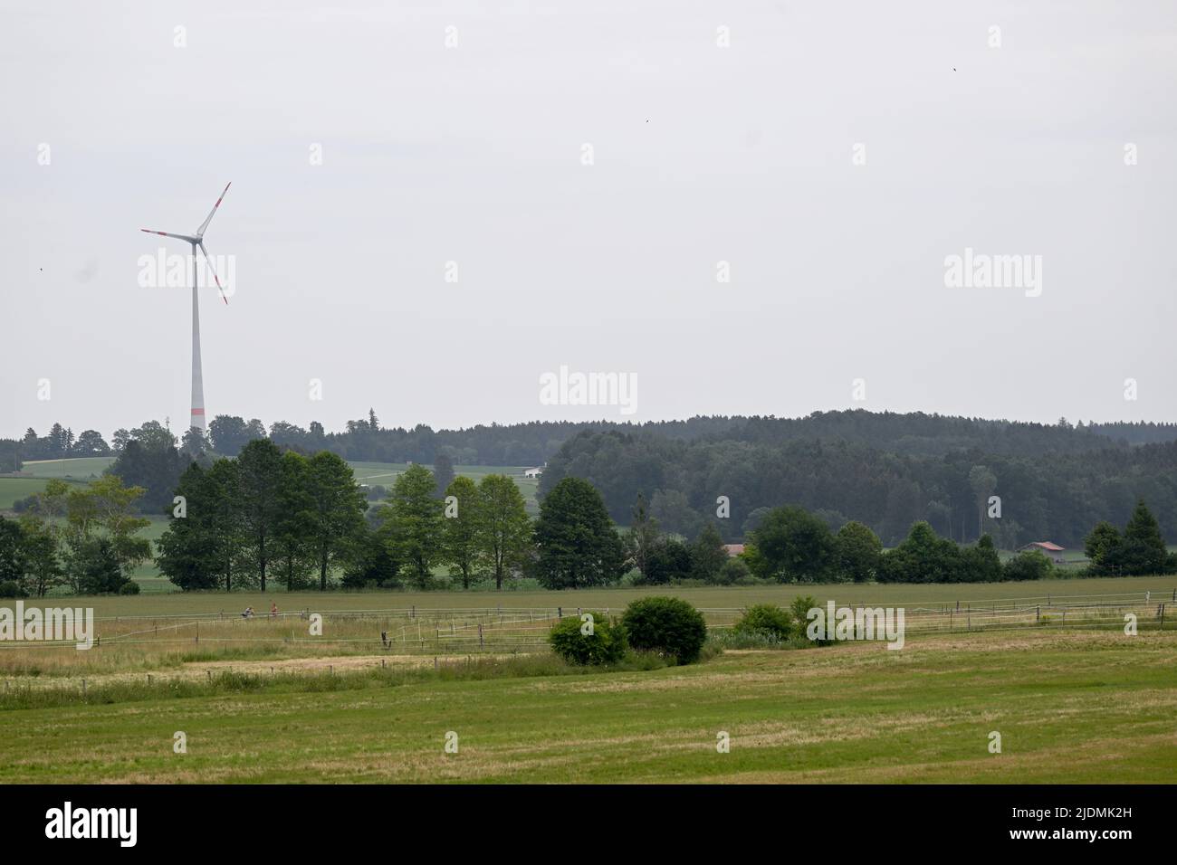 Bruck, Germany. 22nd June, 2022. A wind turbine can be seen behind ...