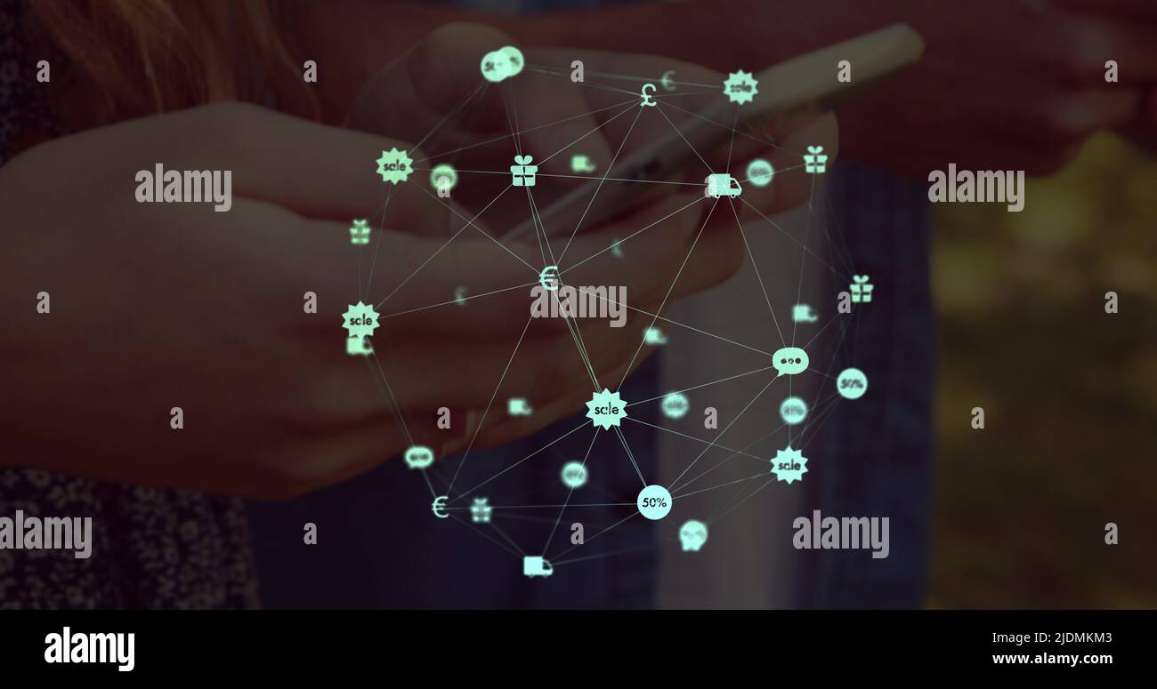 Image of network of connections with icons over women using smartphone ...
