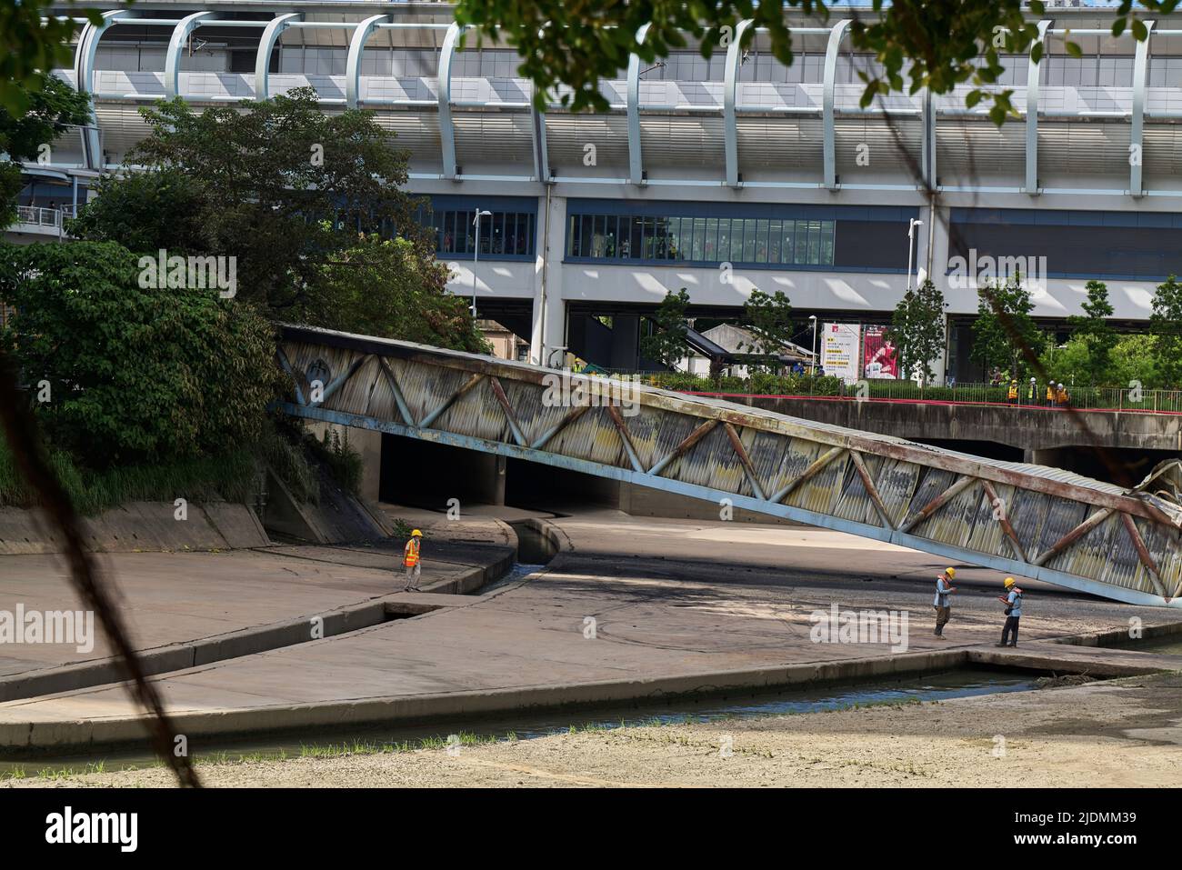 Hong Kong, China. 22nd June, 2022. Workers prepare to repair a broken ...