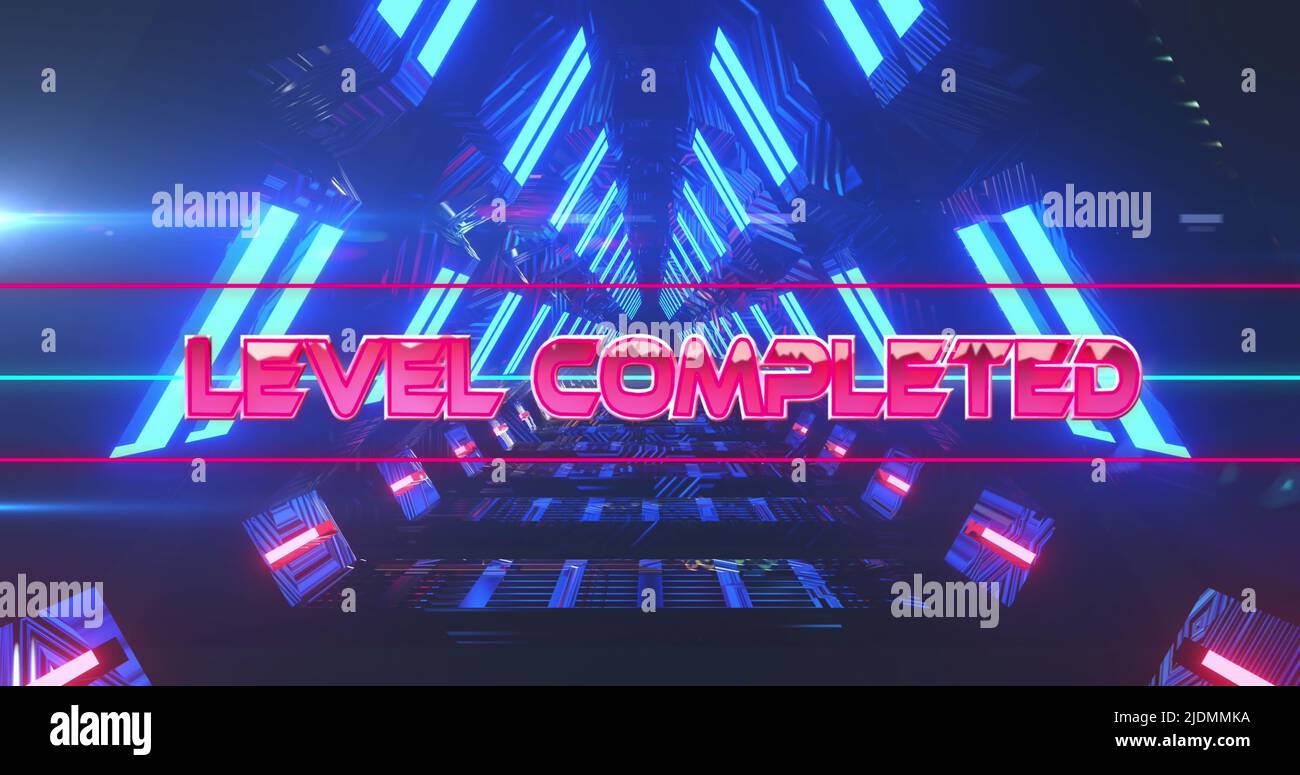 Image of level completed text over digital tunnel Stock Photo - Alamy