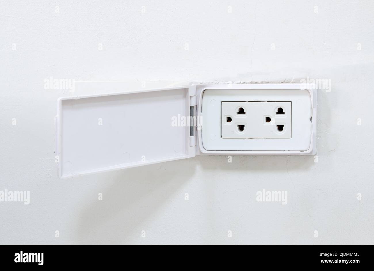 The white power outlet with cover to protect the electric shock of the ...