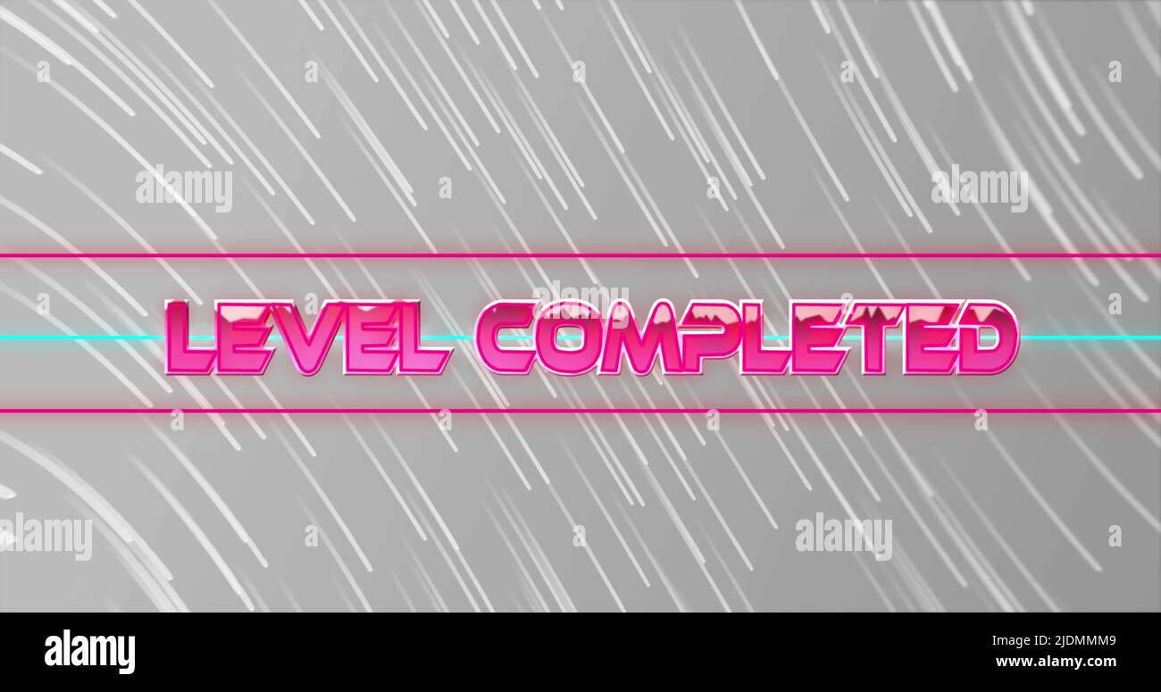 Image of level completed text over white trails of lights Stock Photo ...