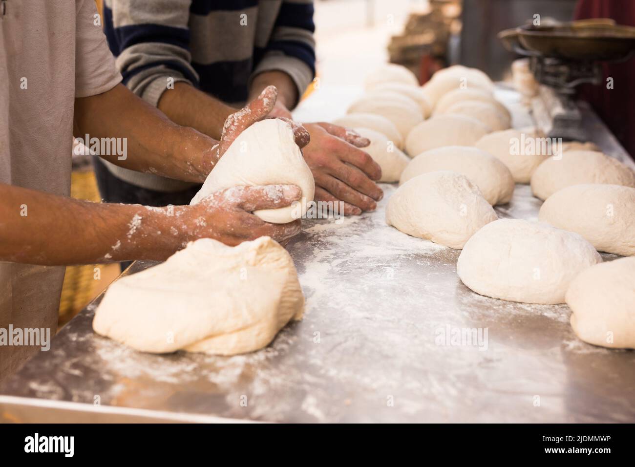 process of making bread. dough kneading Stock Photo - Alamy