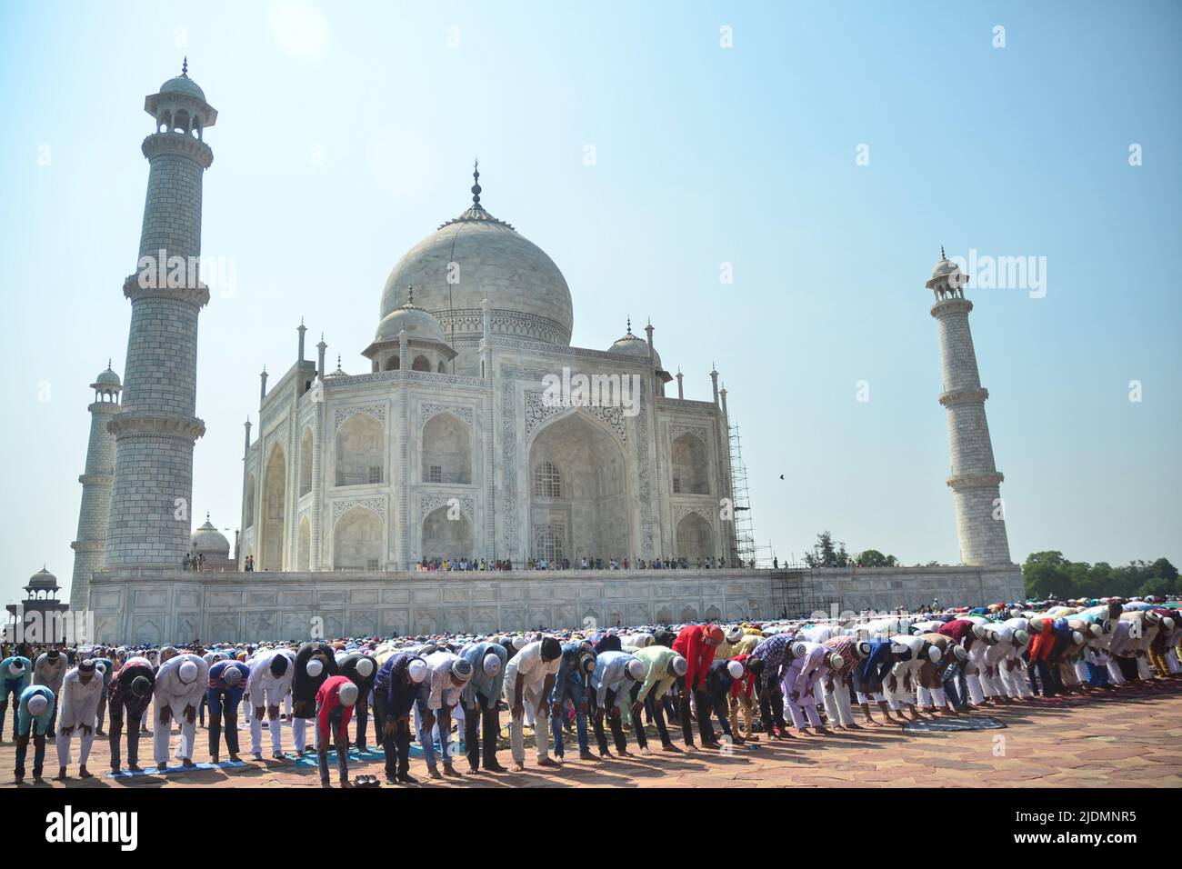 Muslims offer prayers during Eid al-Fitr at a Mosque on the premises of ...