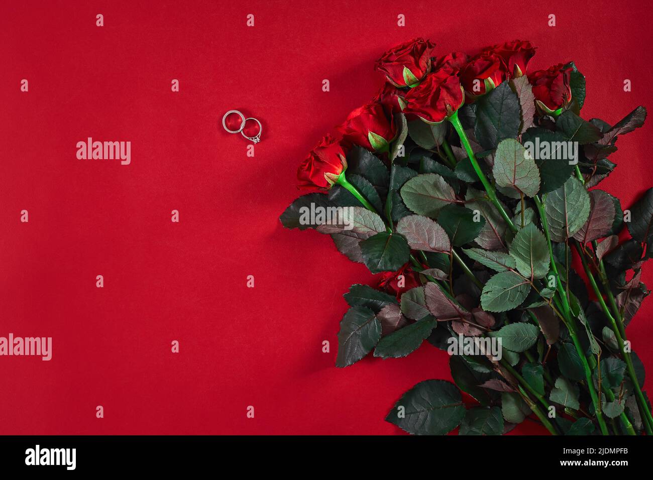 Close-up beautiful red roses bouquet on red background for valen Stock ...