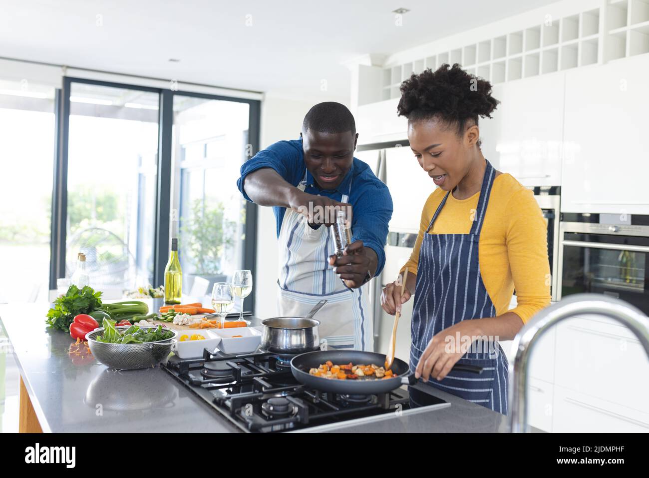 Food on stove hi-res stock photography and images - Alamy