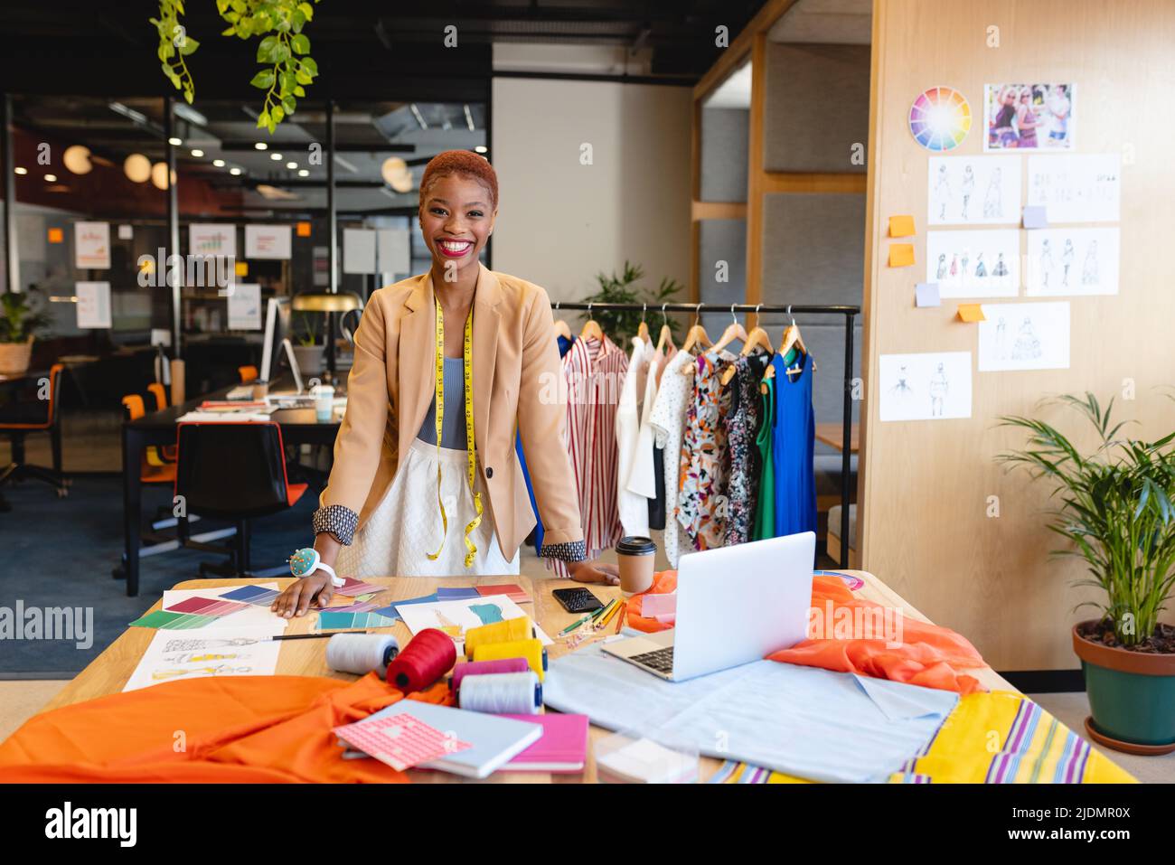Portrait of an African American female fashion designer with pattern ...