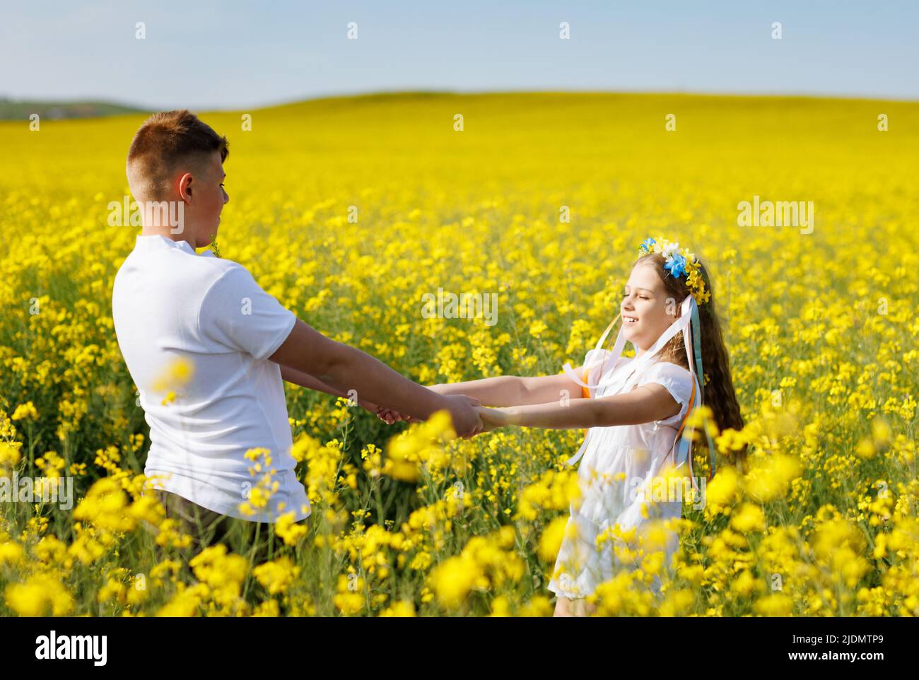 Cheerful joyful teenagers: older brother and laughing sister with ...