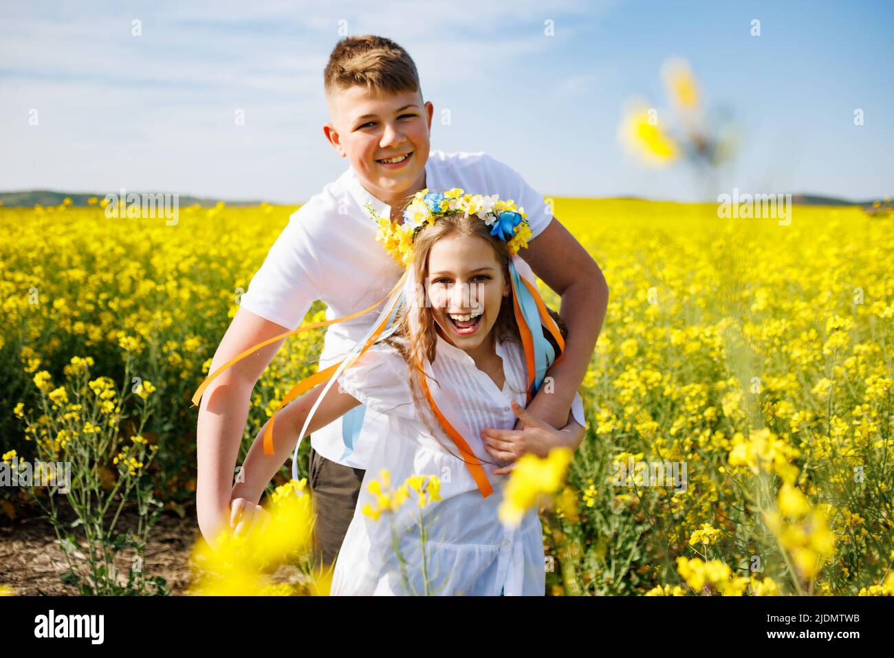 Cheerful joyful teenagers: older brother and laughing sister with ...
