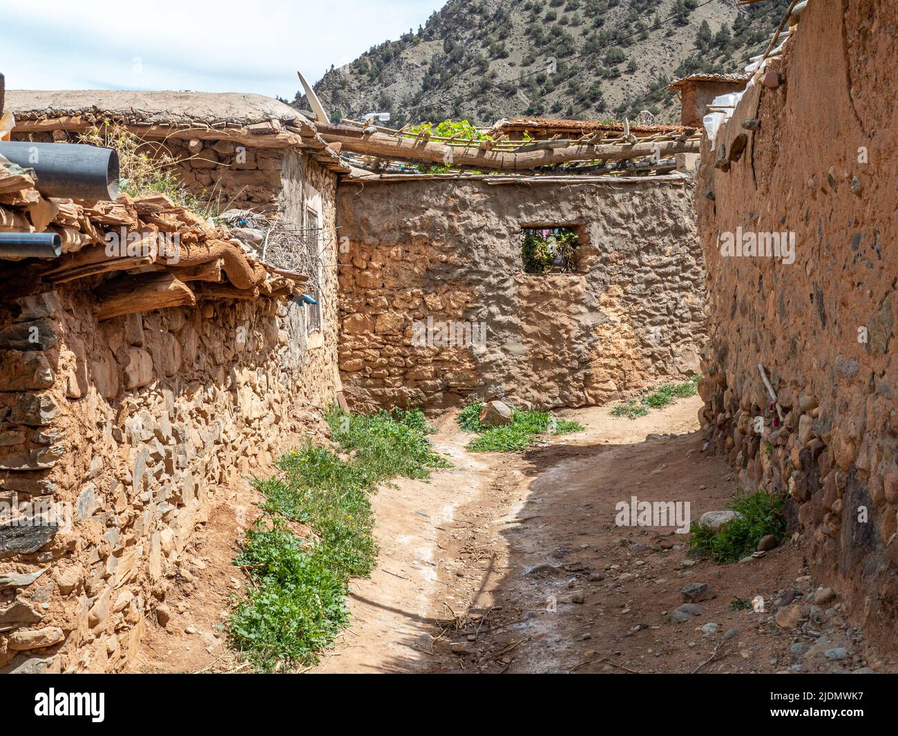 Berber family village with walls made from stones and clay, and doors ...