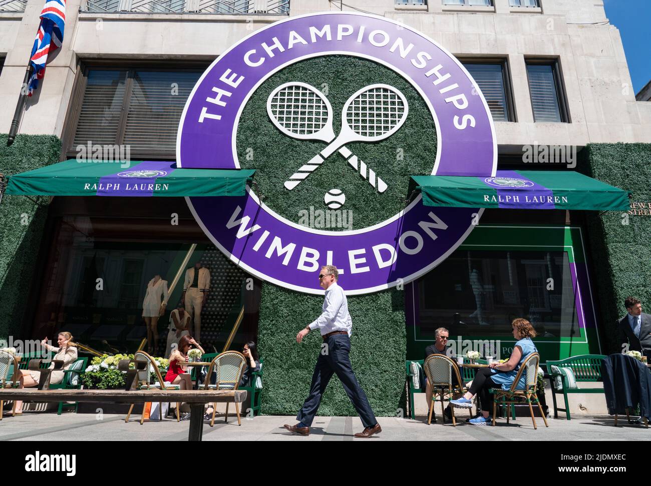 A pedestrian passes the Wimbledon tennis championship themed Ralph ...