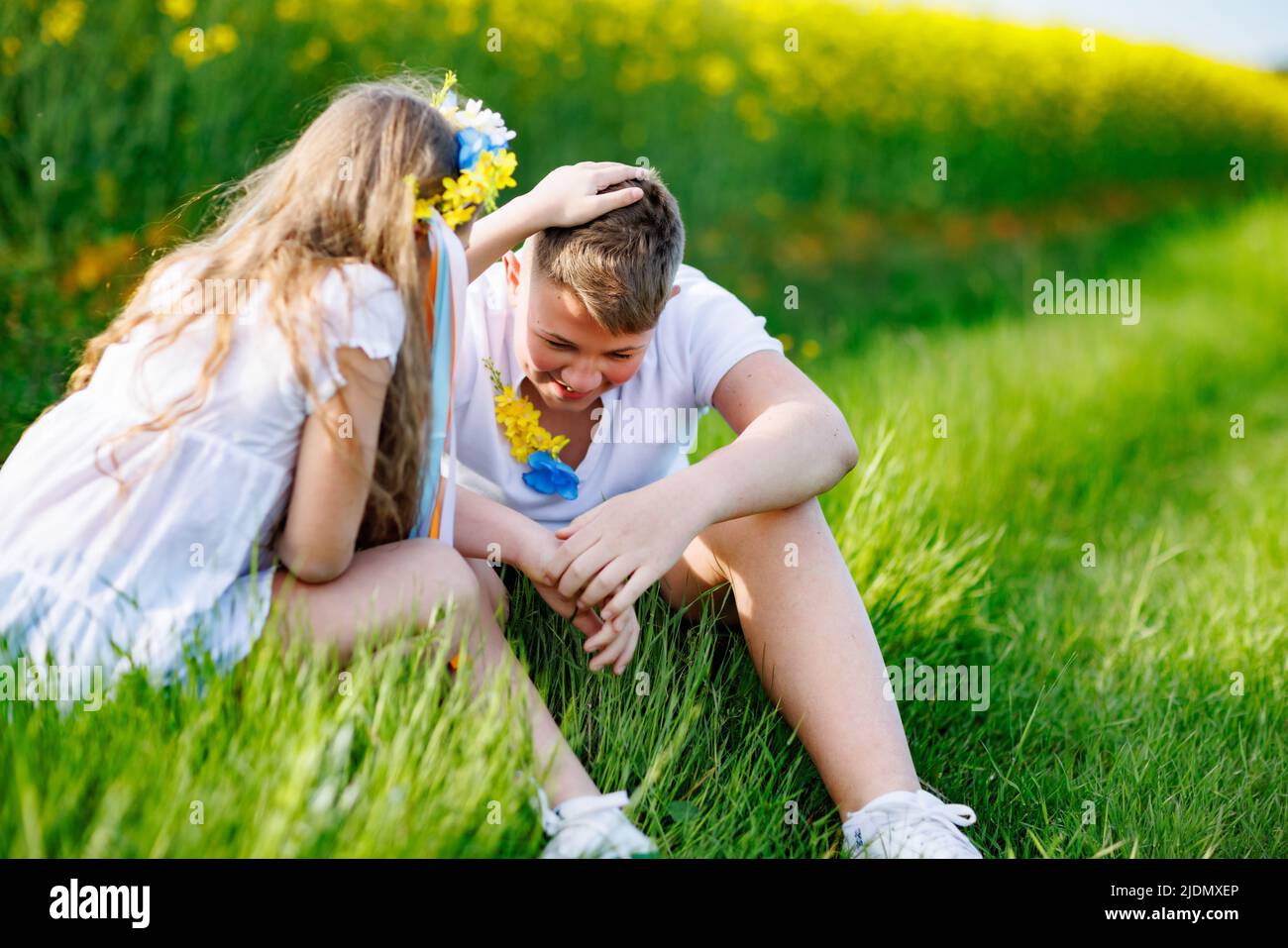 Native joyful teenage children enjoying warm weather: big strong kind ...