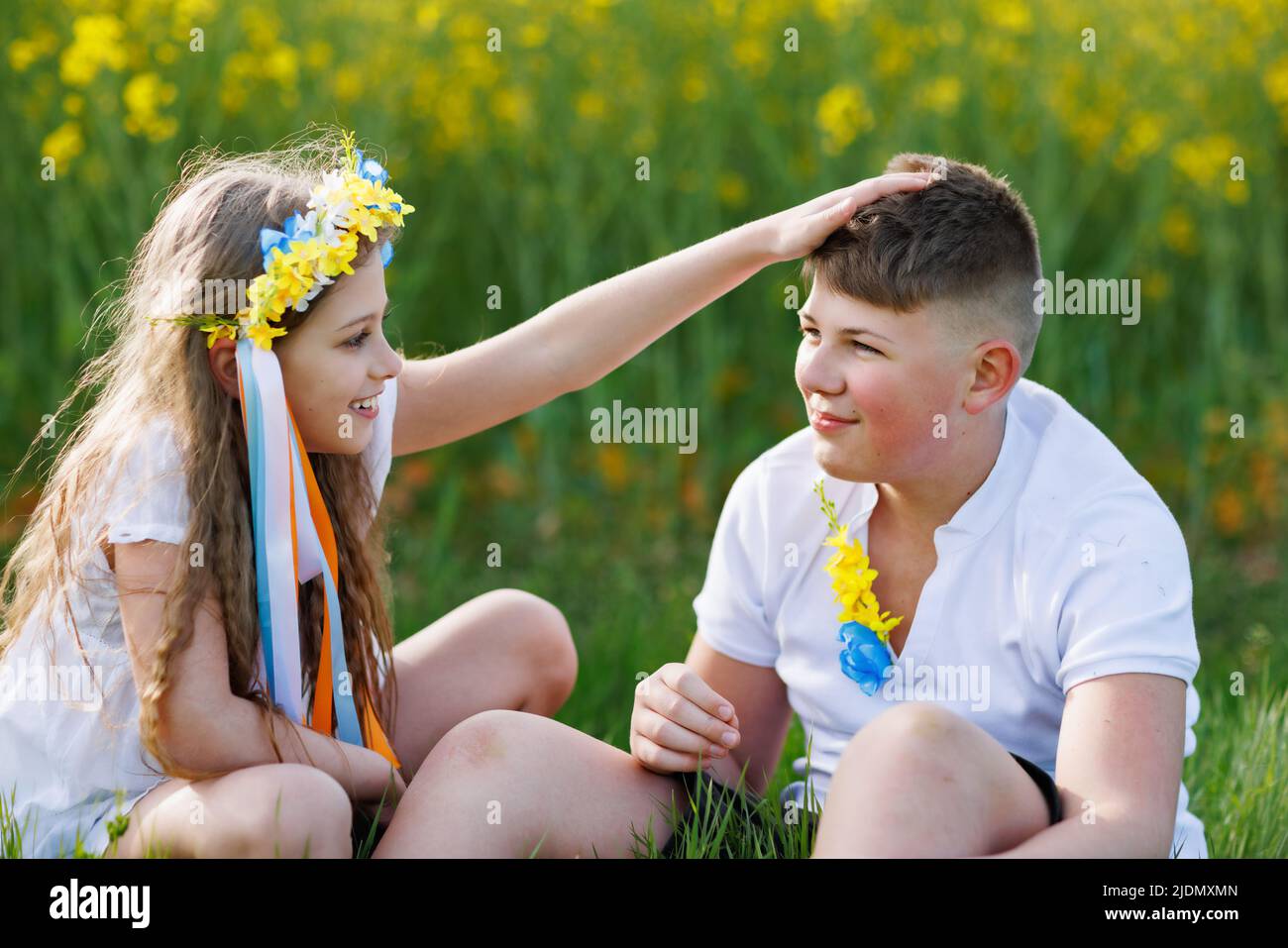 Native joyful teenage children enjoying warm weather: big strong kind ...