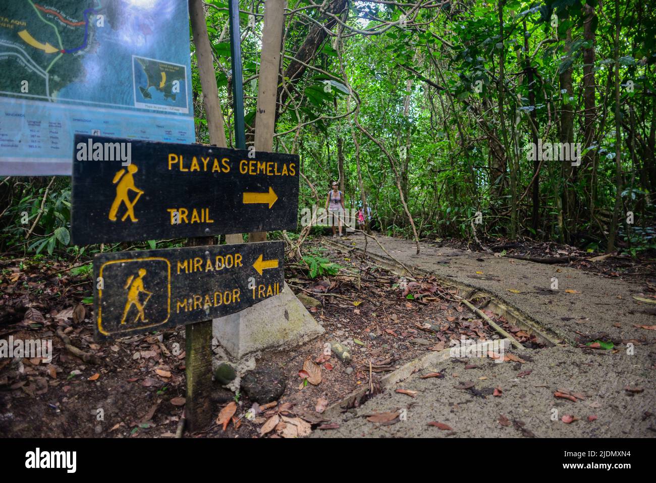 Wooden sign indicates way to the Beach in Manuel Antonio National Park ...