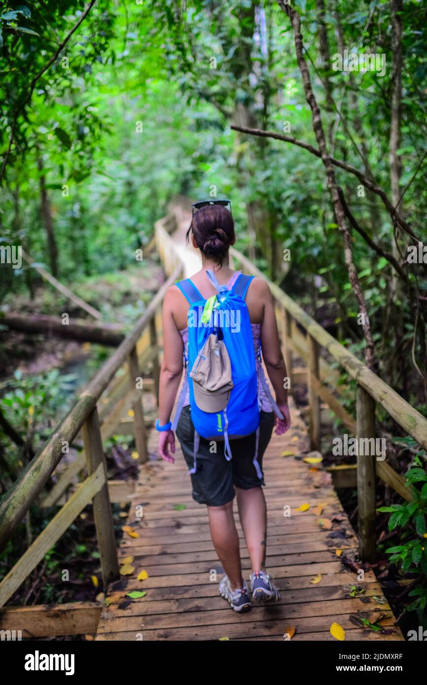 Young caucasian adventurous woman exploring Manuel Antonio National ...