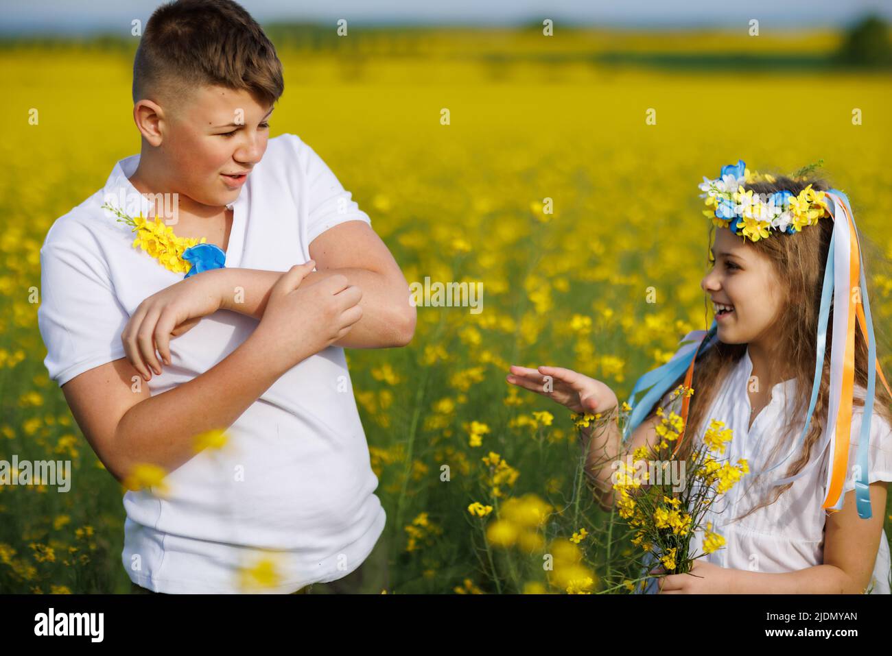 Cheerful joyful teenagers: older brother and laughing sister with ...