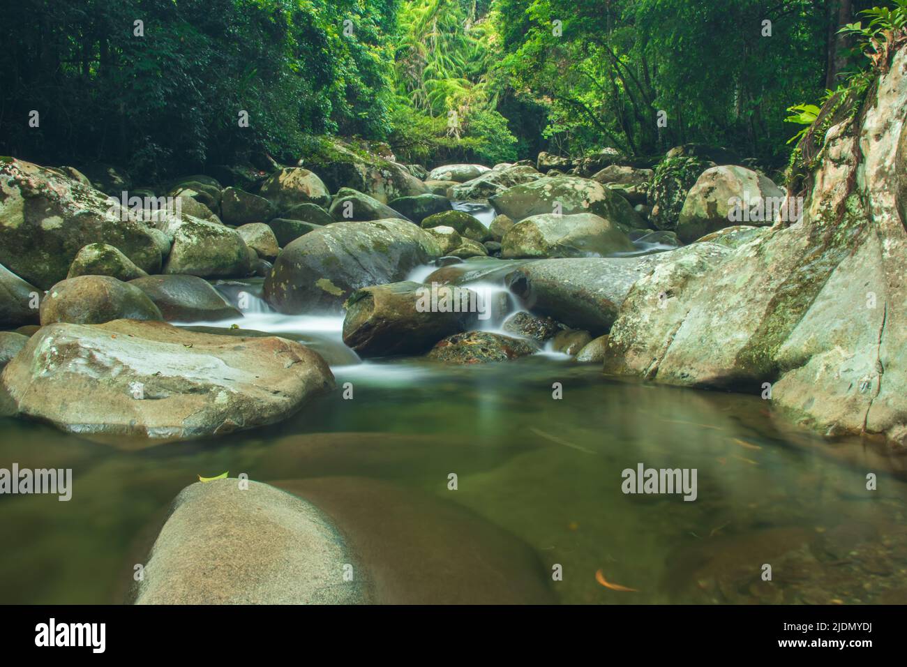 Photo of water flowing between rocks, Mountala river, Aceh, Indonesia ...