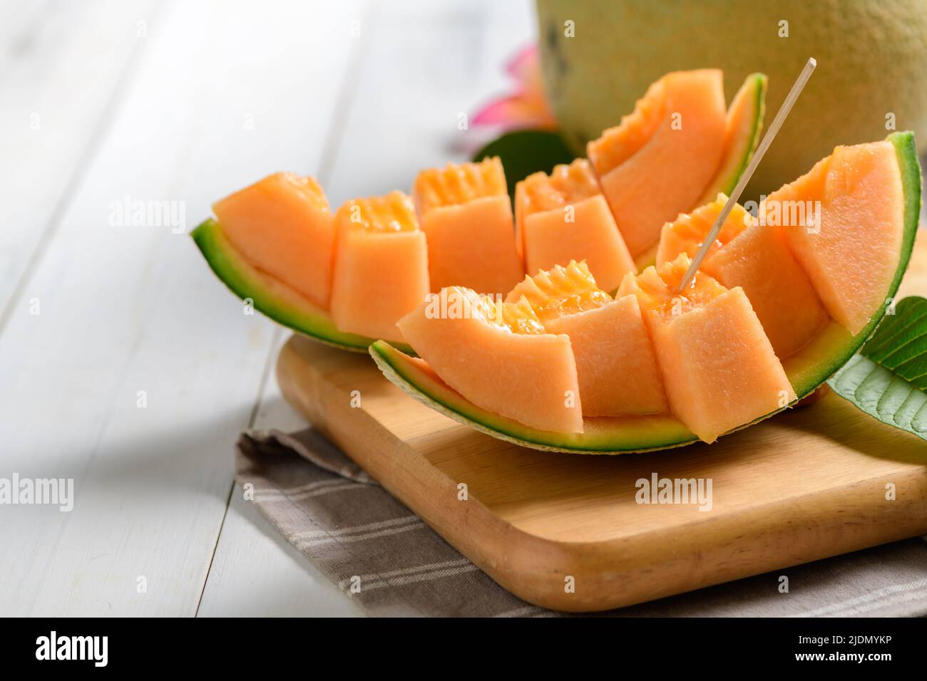 slice of japanese melons, orange melon or cantaloupe melon on white ...