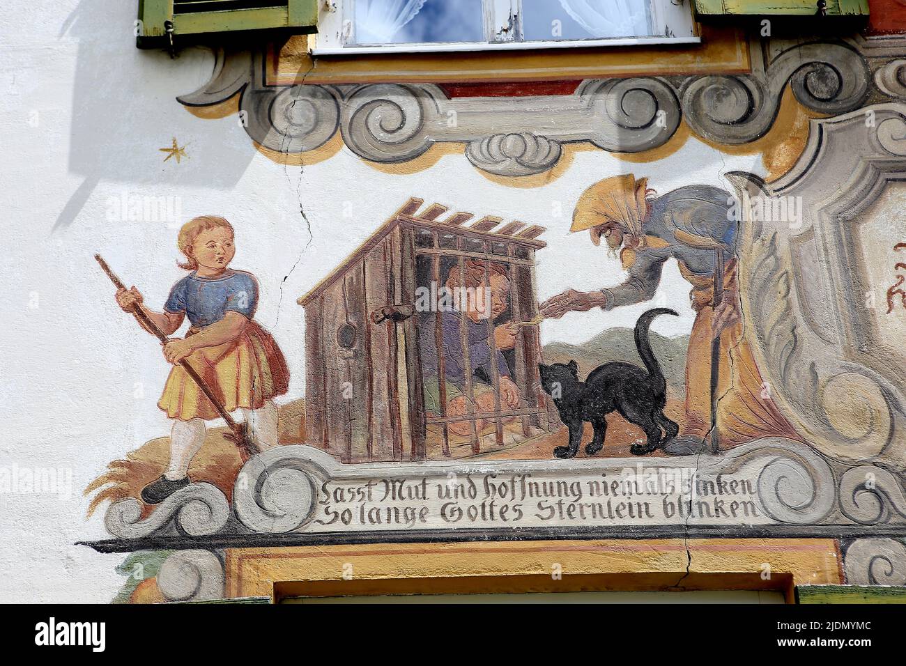 Mural paintings on houses facades in the streets of Oberammergau ...