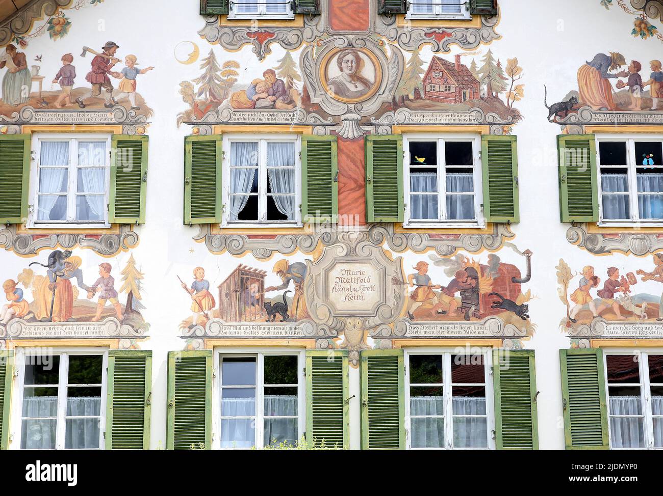 Mural paintings on houses facades in the streets of Oberammergau ...
