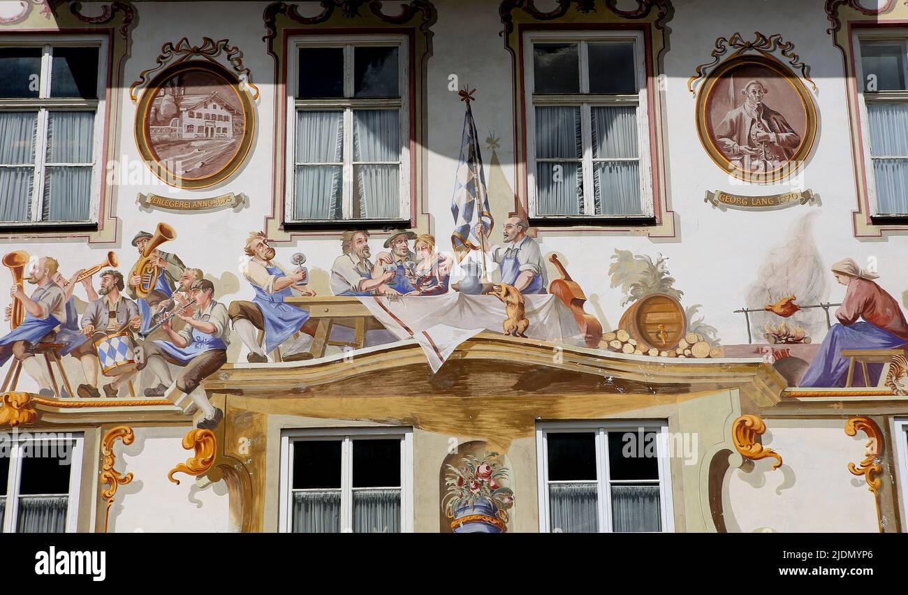 Mural paintings on houses facades in the streets of Oberammergau ...