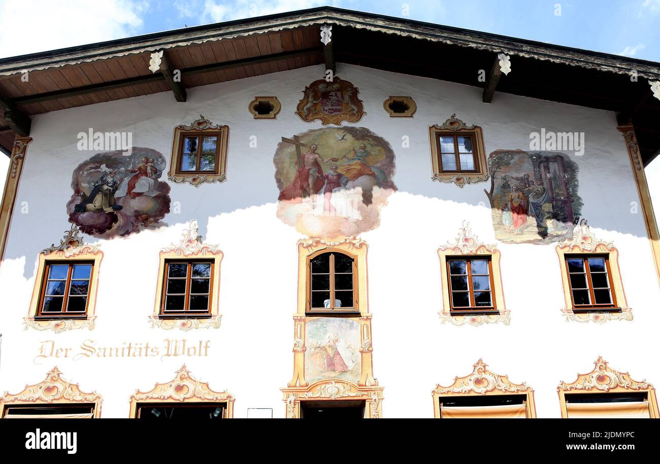 Mural paintings on houses facades in the streets of Oberammergau ...