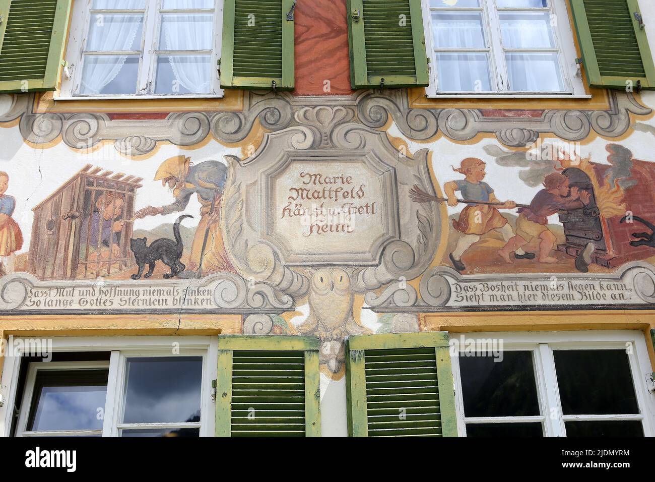 Mural paintings on houses facades in the streets of Oberammergau ...