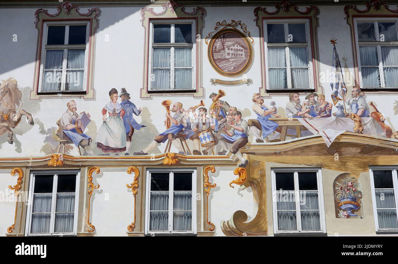 Mural paintings on houses facades in the streets of Oberammergau ...