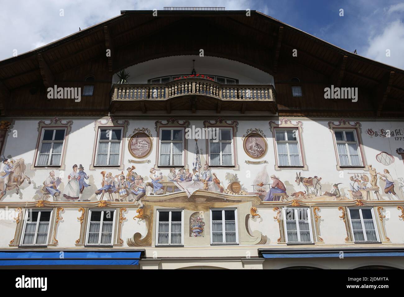 Mural paintings on houses facades in the streets of Oberammergau ...