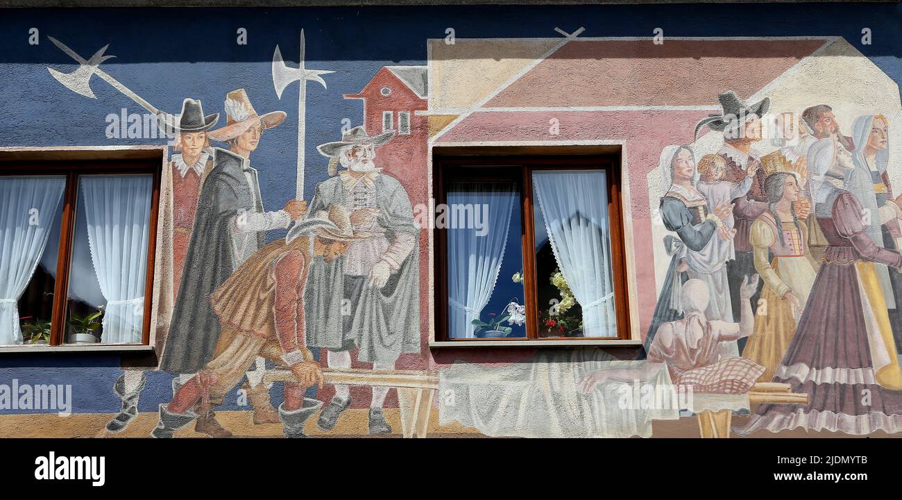 Mural paintings on houses facades in the streets of Oberammergau ...