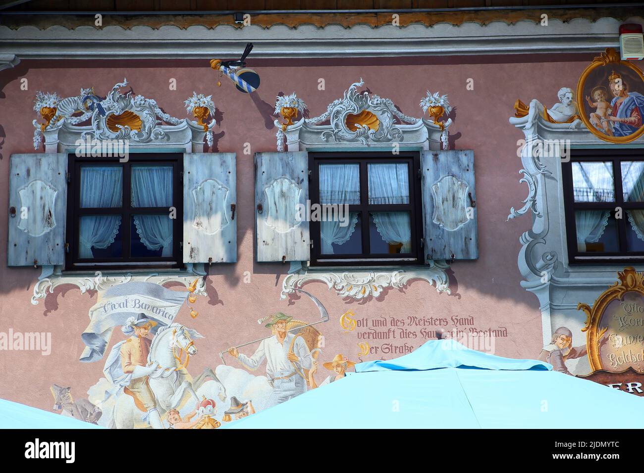 Mural paintings on houses facades in the streets of Oberammergau ...