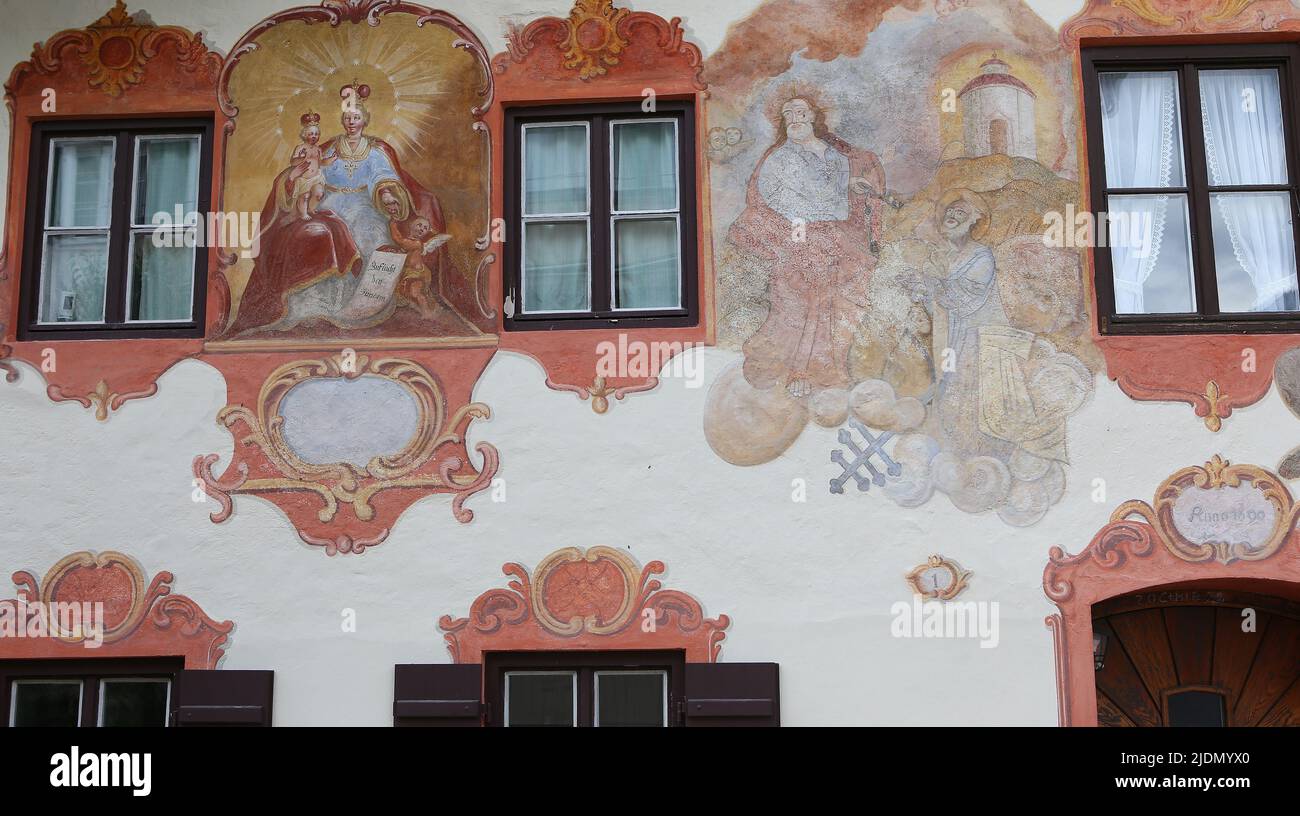 Mural paintings on houses facades in the streets of Oberammergau ...