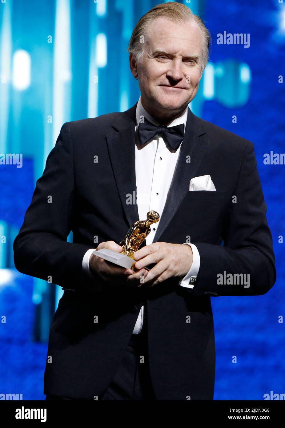 Ulrich Thomsen poses with the Best Actor Award for 'Trom' next to Jury ...