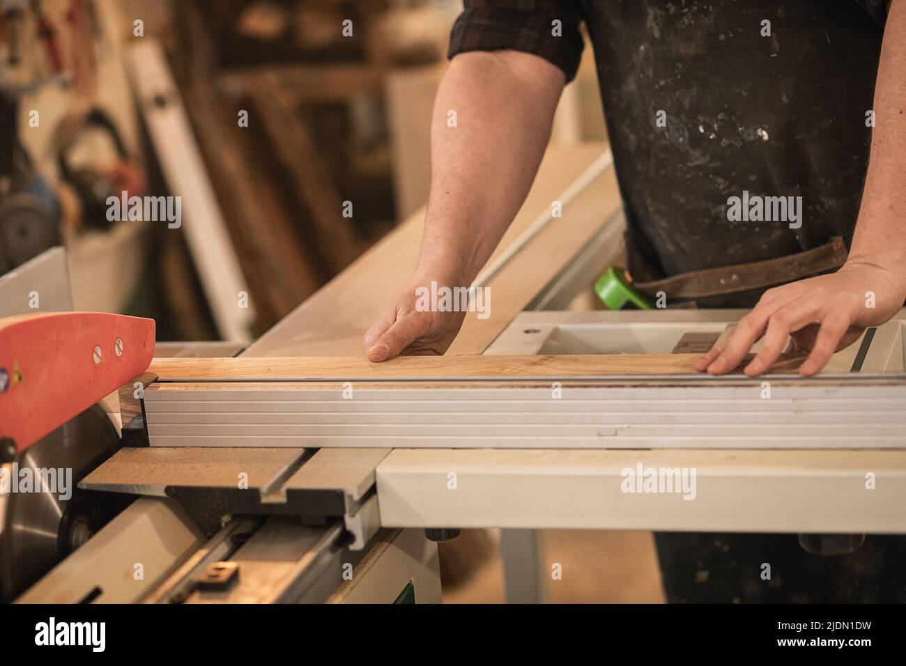 Cropped of businessman carpenter hands working with wood timber ...