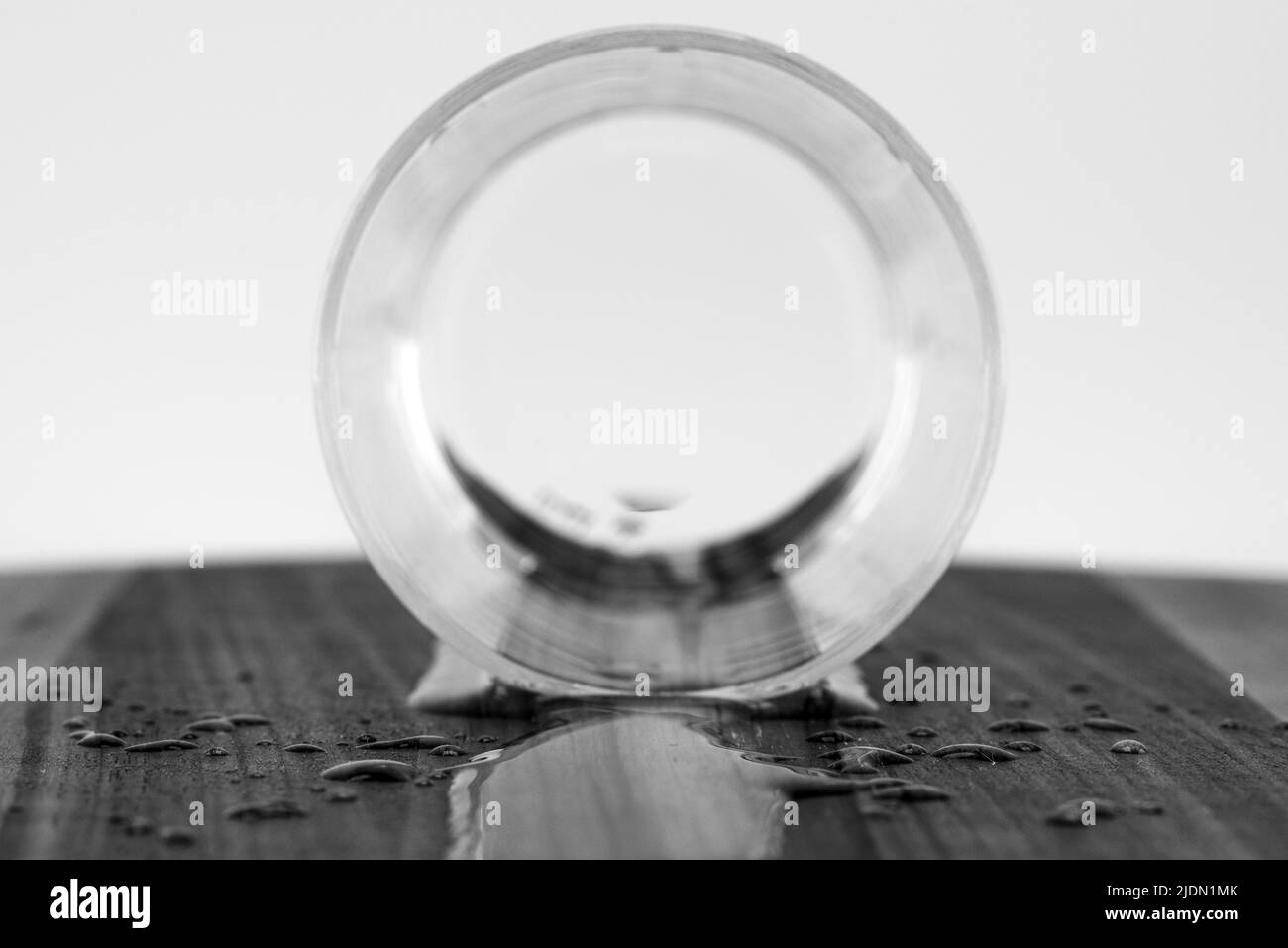 Spilled glass of water in black and white and close up mode Stock Photo ...