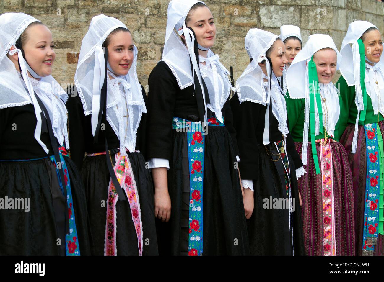 Breton dancers in traditional costume and headdresses Stock Photo - Alamy