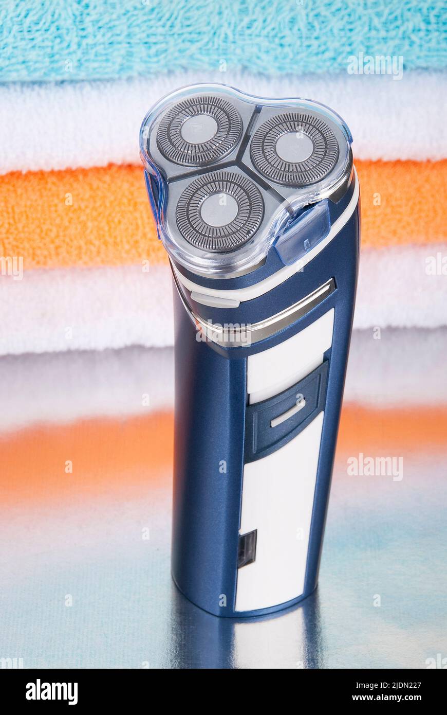Electric Machine shaving with towels Stock Photo - Alamy