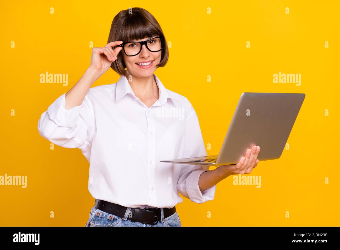 Photo of positive business lady hold computer prepare project wear ...