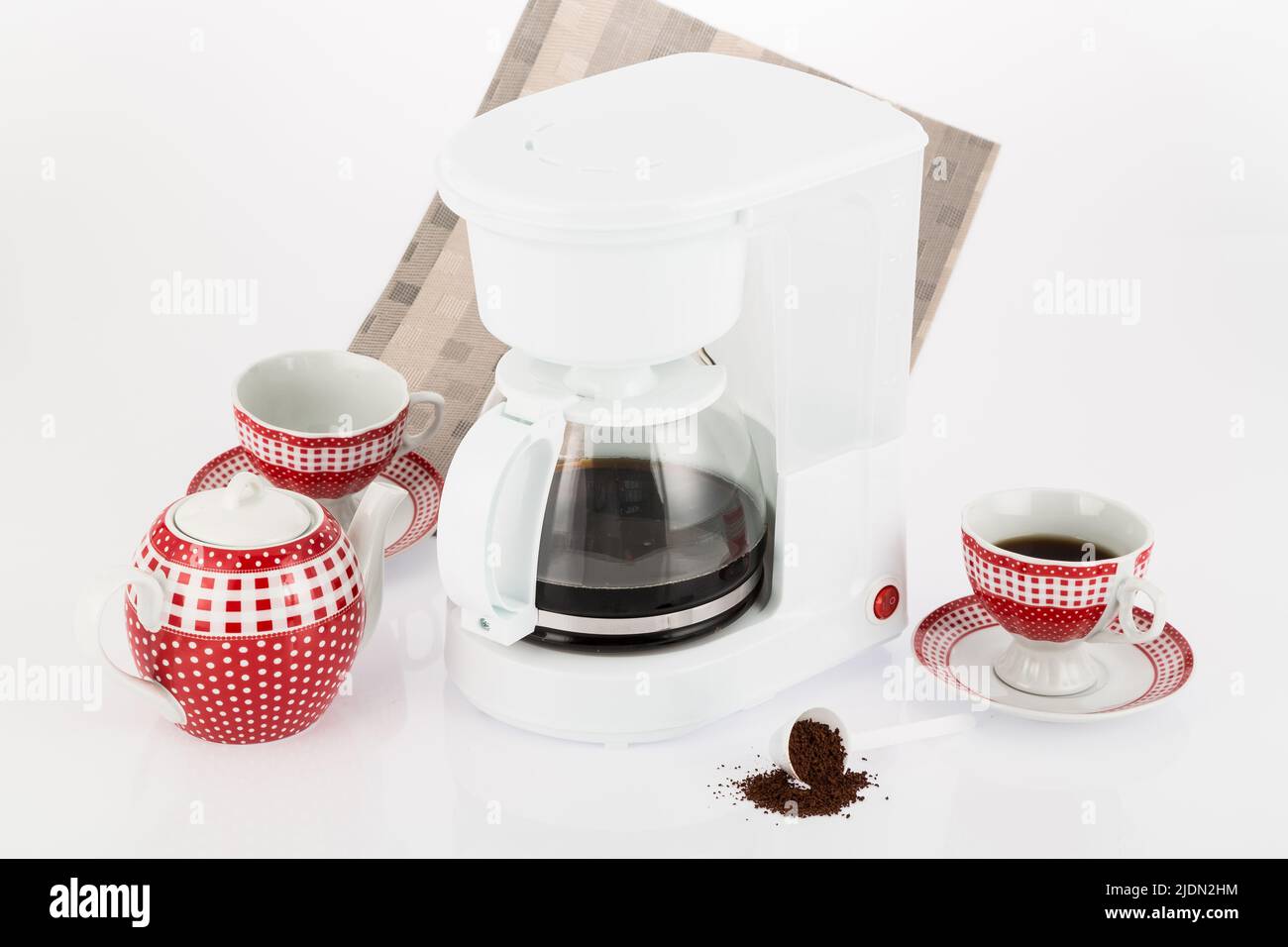 Coffee maker white, with mugs on white background Stock Photo - Alamy