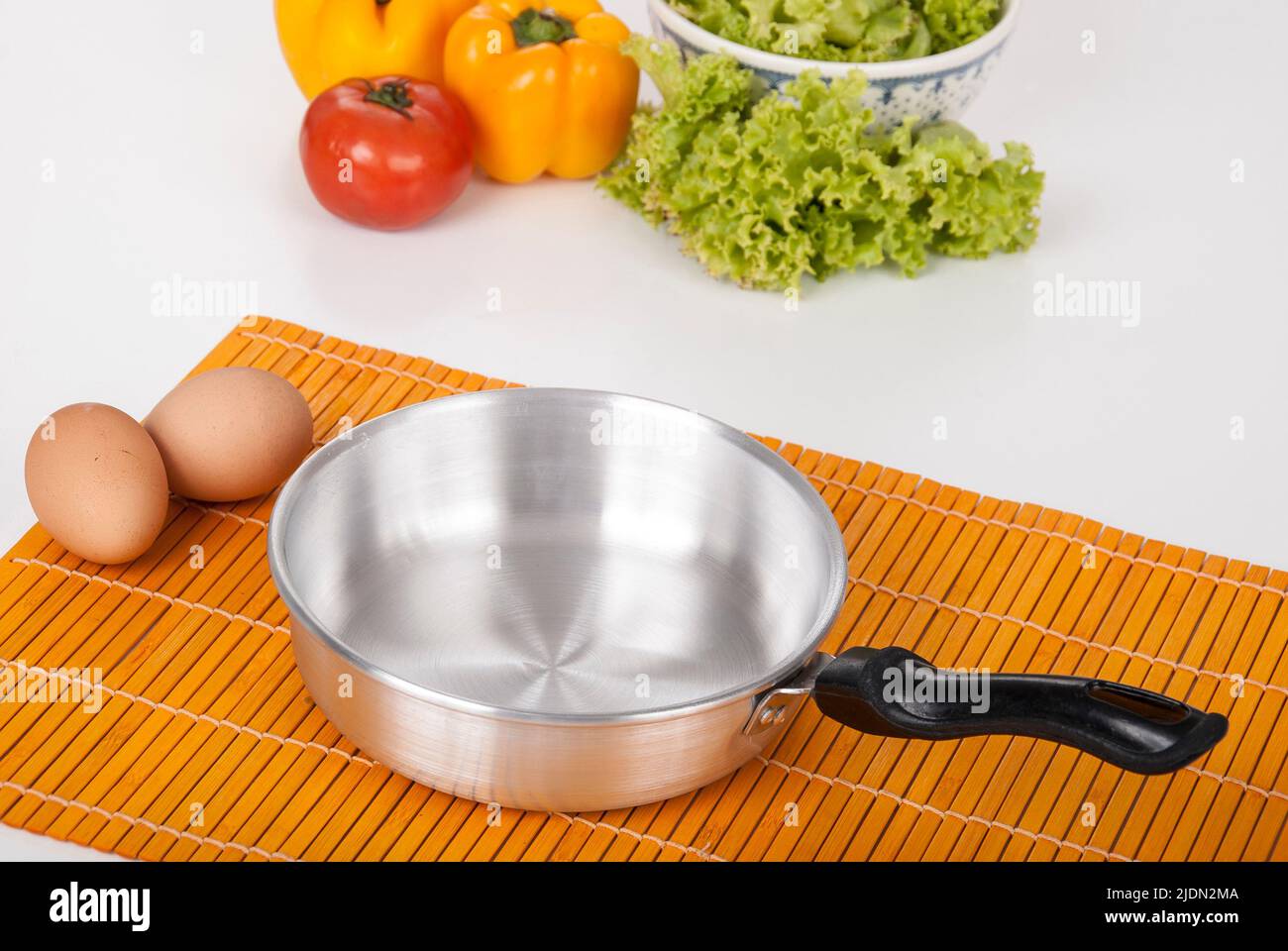 Frying pan on white background Stock Photo - Alamy