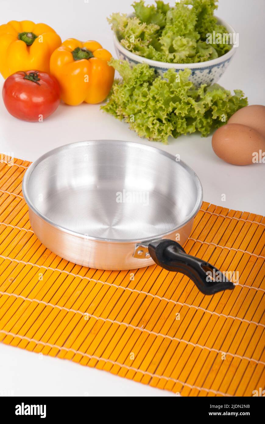 Frying pan on white background Stock Photo - Alamy